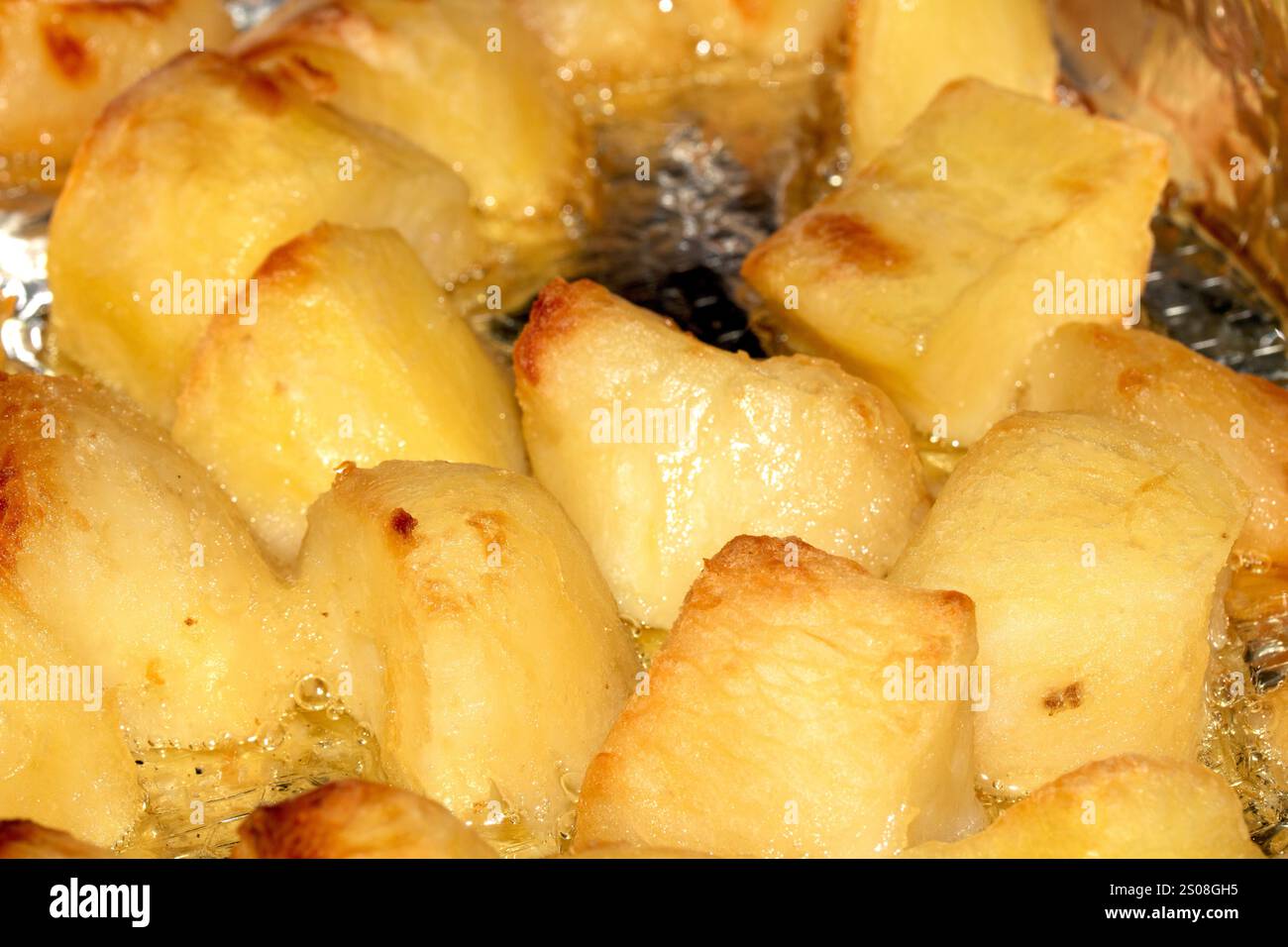 Close Up of Golden Roast Potatoes Cooked Stock Photo - Alamy