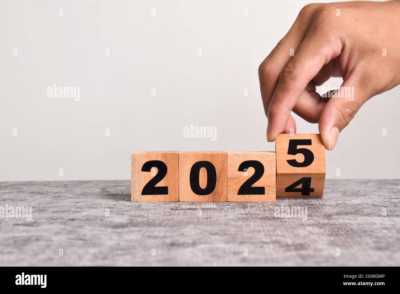 Hand flipping wooden blocks by hand from 2024 to 2025, Business ...