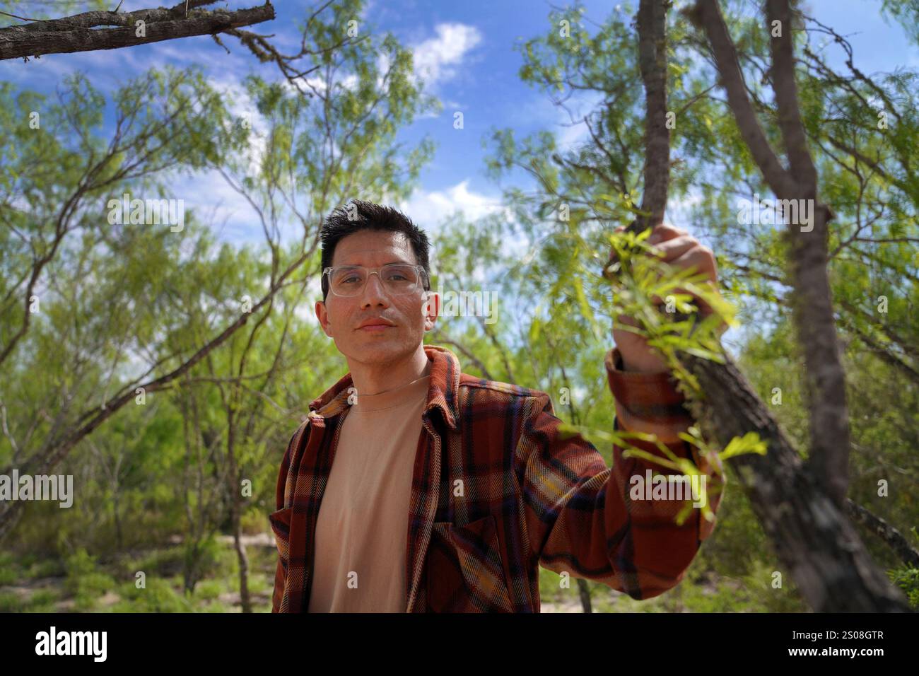 Yankton Sioux and Apache tribal member Adrian Primeaux, stands for a ...