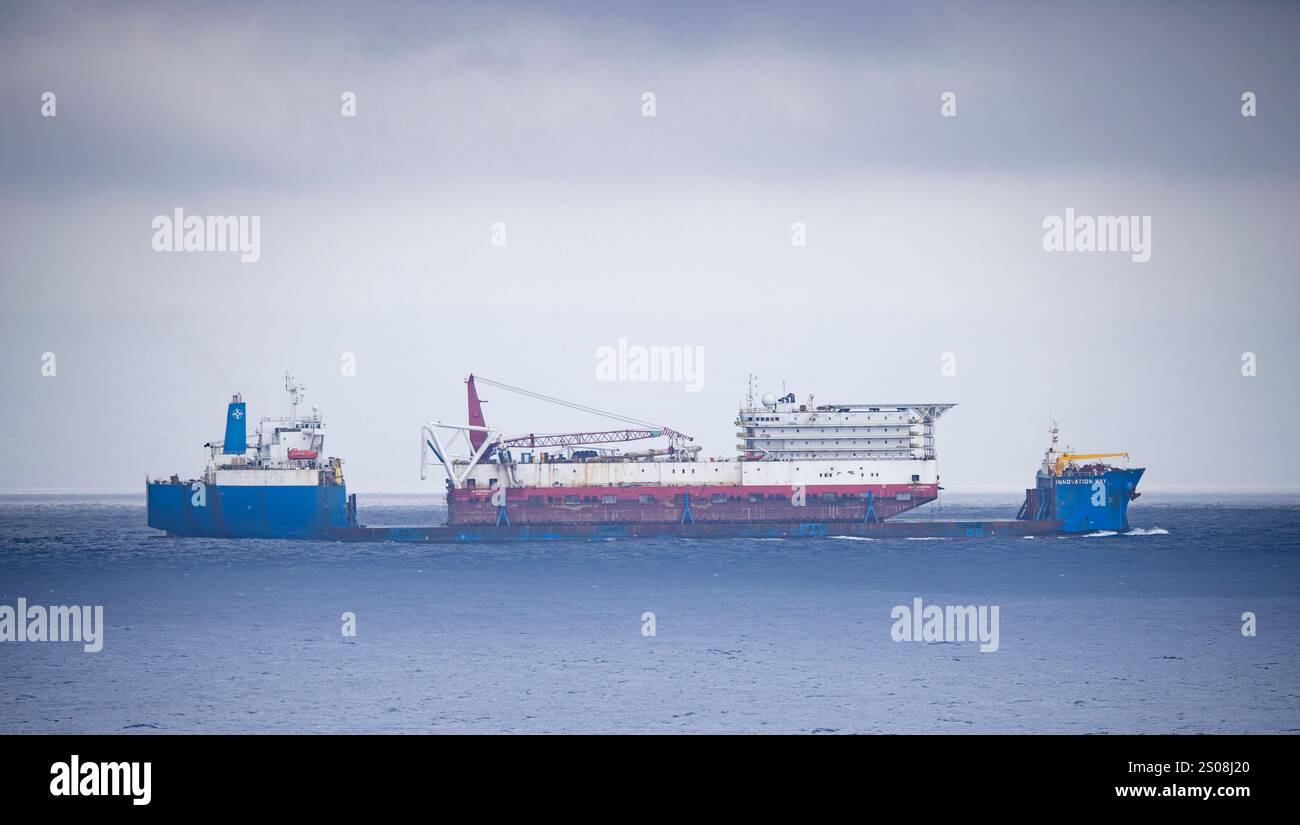 Pipe Laying ship DLB Kenenna being transported aboard ship Innovation ...