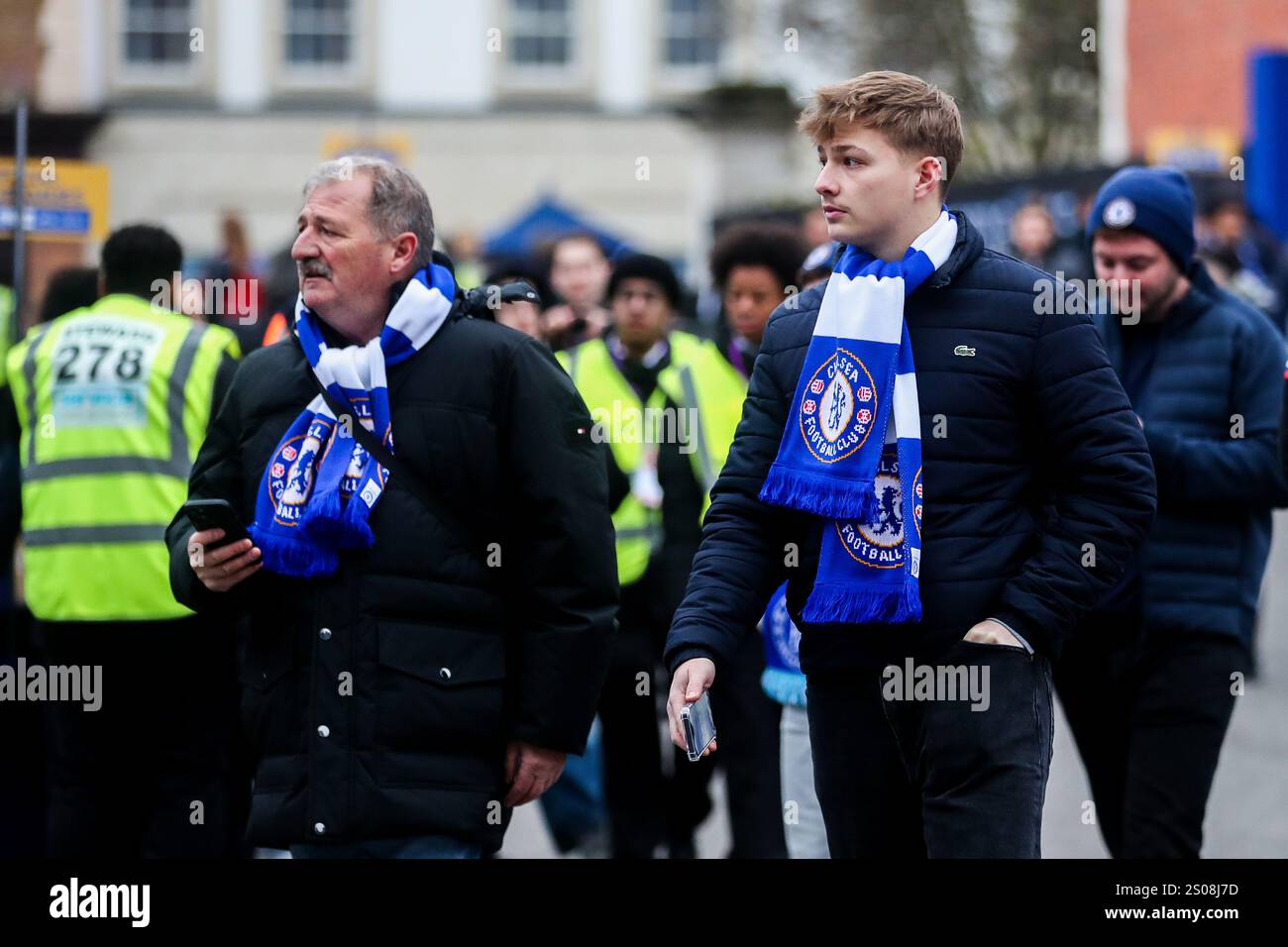 Fans arrive at Stamford Bridge prior to the Premier League match ...