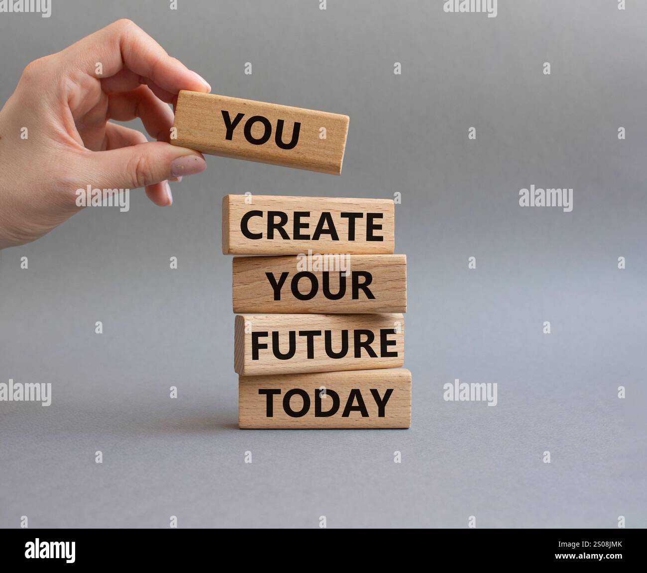 Future and development symbol. Wooden blocks with words You Create your ...