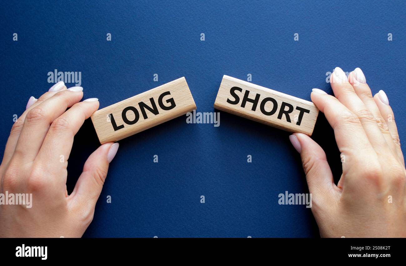 Short vs Long symbol. Concept word Short vs Long on wooden blocks ...