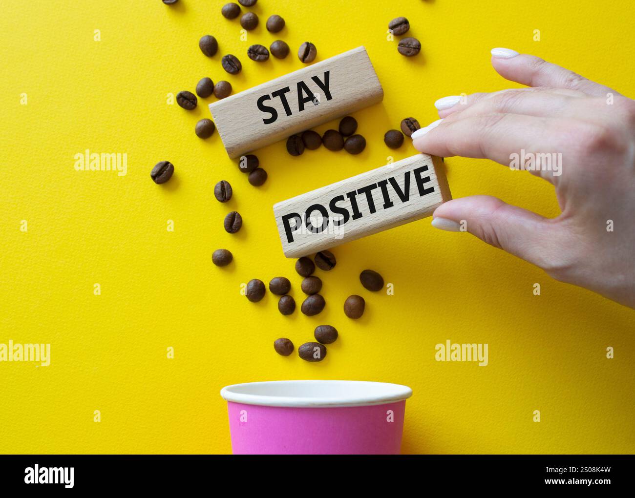 Stay Positive symbol. Concept word Stay Positive on wooden blocks ...