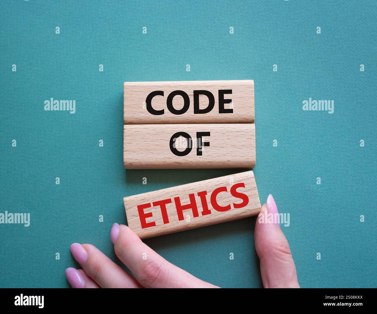 Code of ethics symbol. Concept words Code of ethics on wooden blocks ...