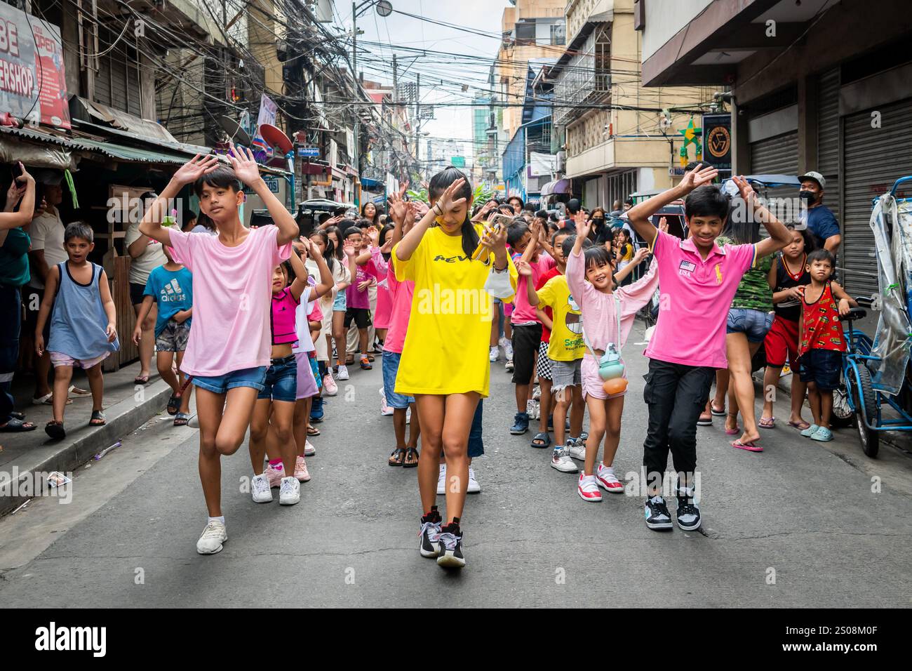 Filipino people celebrate an annual religious festival with a parade ...