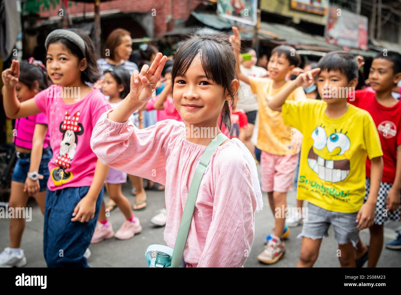 Filipino people celebrate an annual religious festival with a parade ...