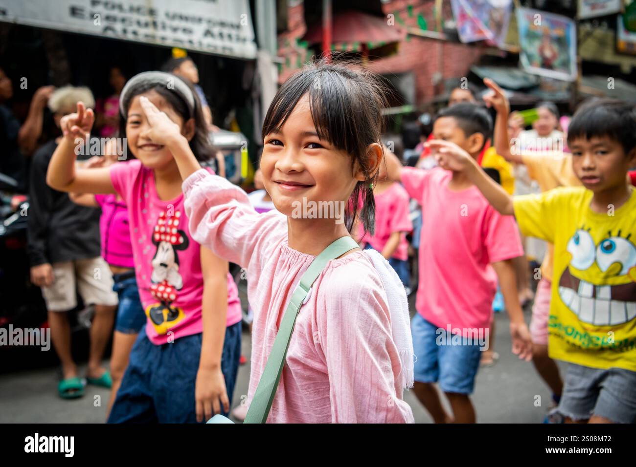 Filipino people celebrate an annual religious festival with a parade ...
