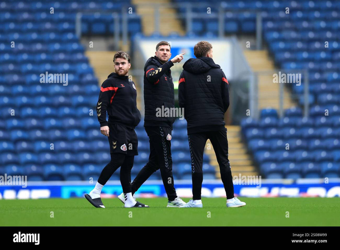 Sunderland's Aaron Connolly (L) and Chris Mepham looks on prior to the ...