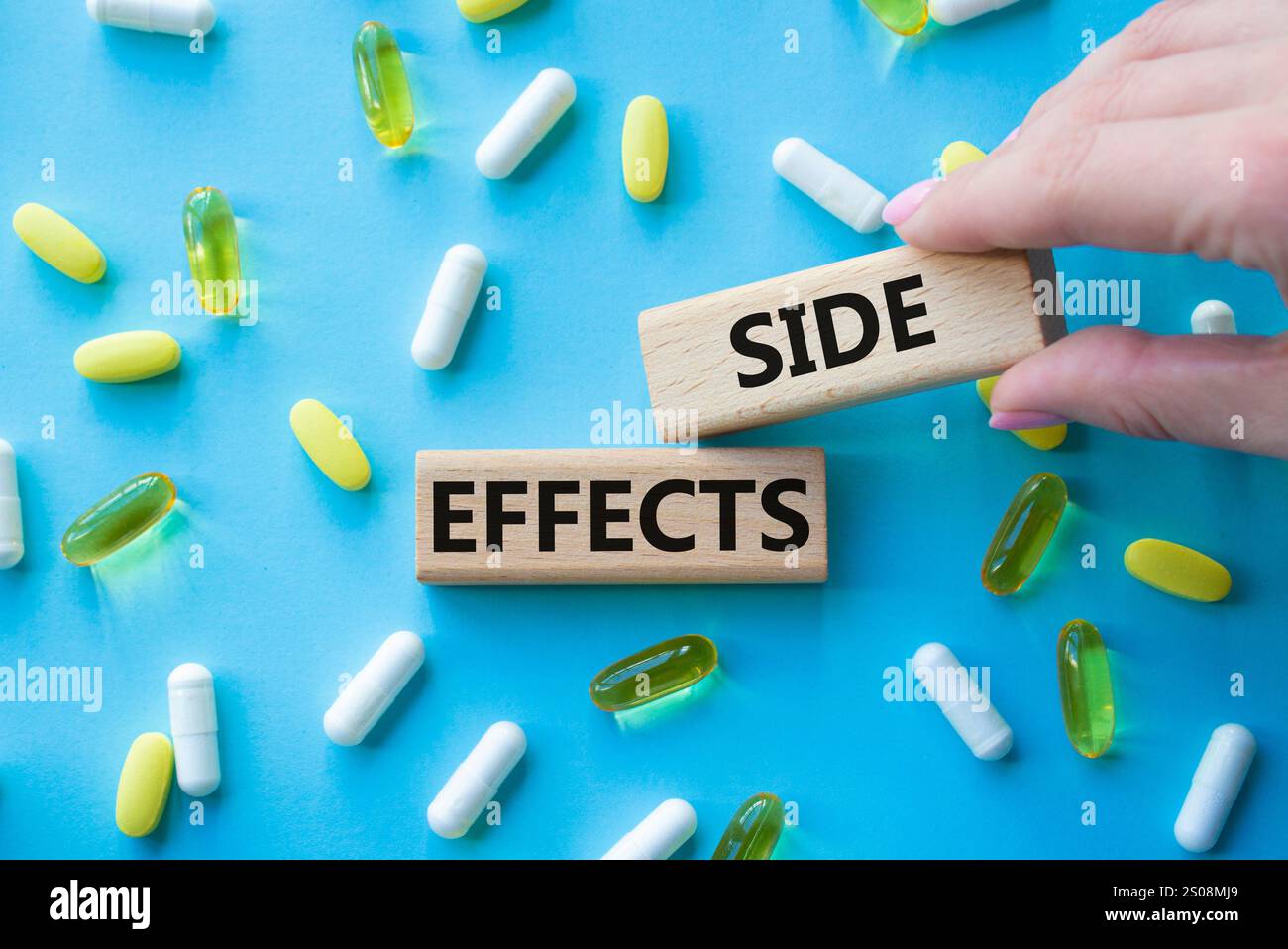 Side Effects symbol. Wooden blocks with words Side Effects. Beautiful ...
