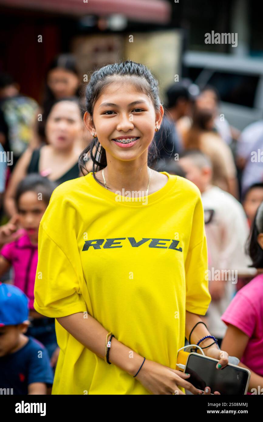 Filipino people celebrate an annual religious festival with a parade ...