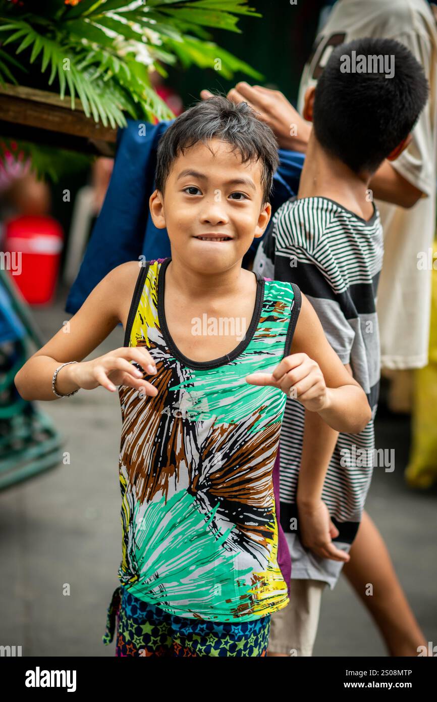Filipino people celebrate an annual religious festival with a parade ...