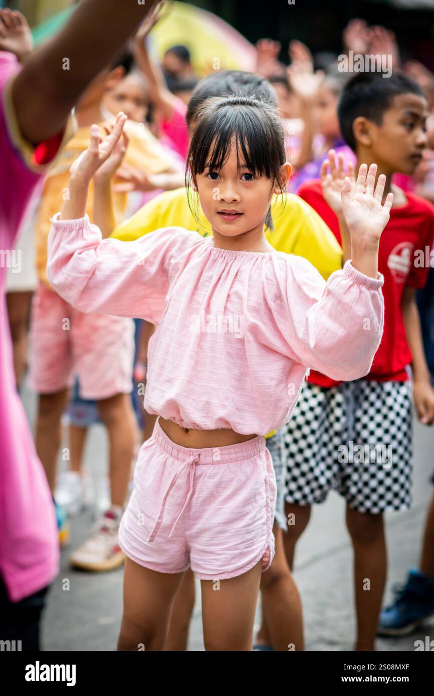 Filipino people celebrate an annual religious festival with a parade ...
