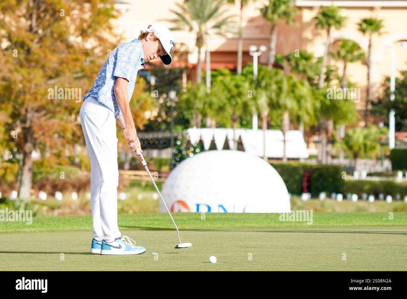 Orlando, Florida, USA. 22nd Dec, 2024. Will McGee putts the 18th green ...