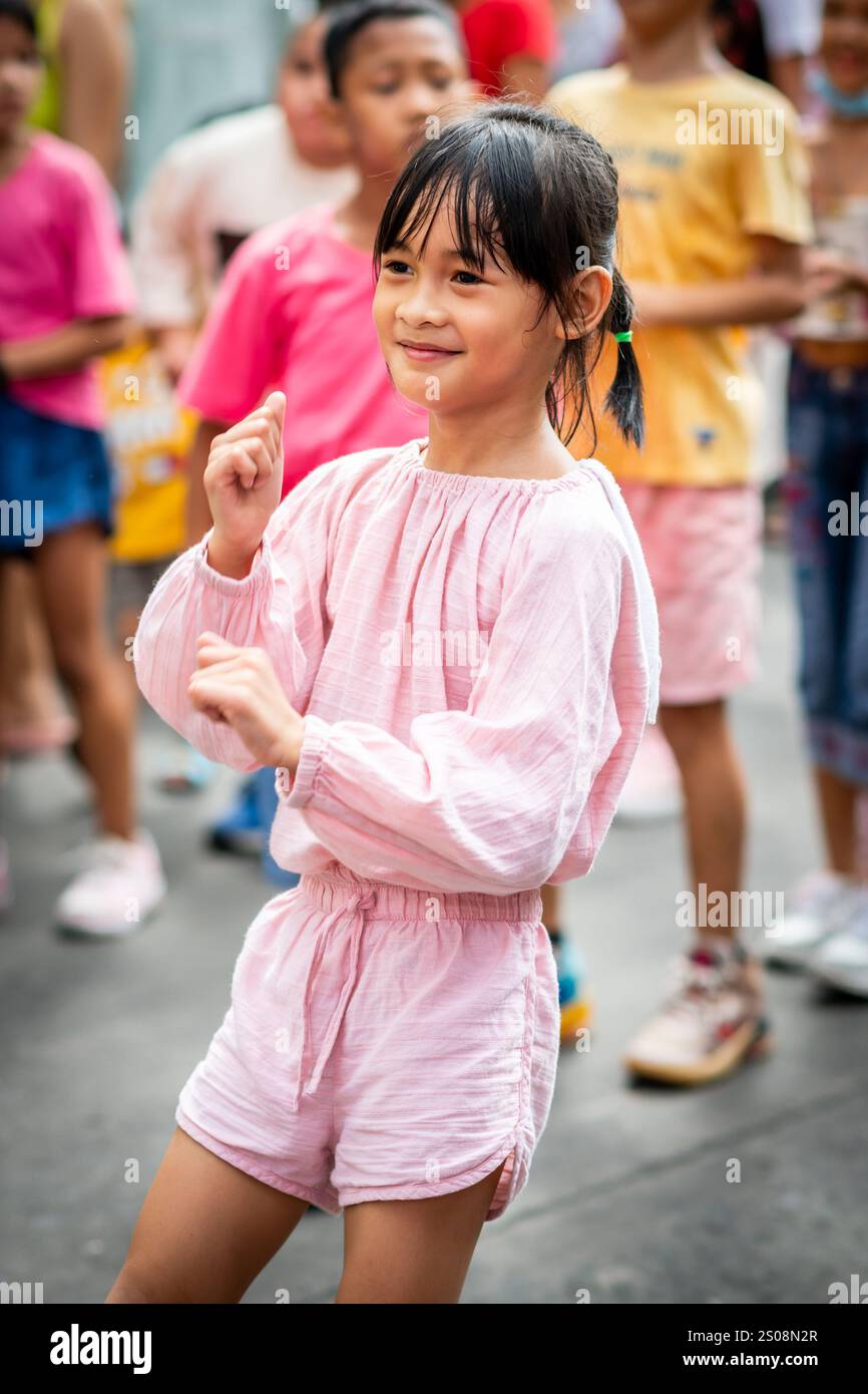 Filipino people celebrate an annual religious festival with a parade ...