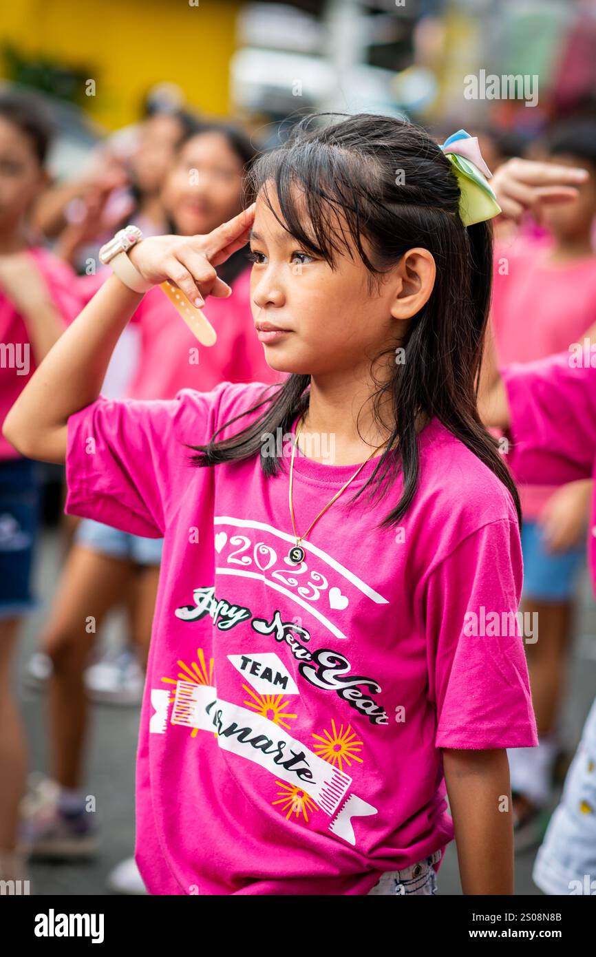 Filipino people celebrate an annual religious festival with a parade ...