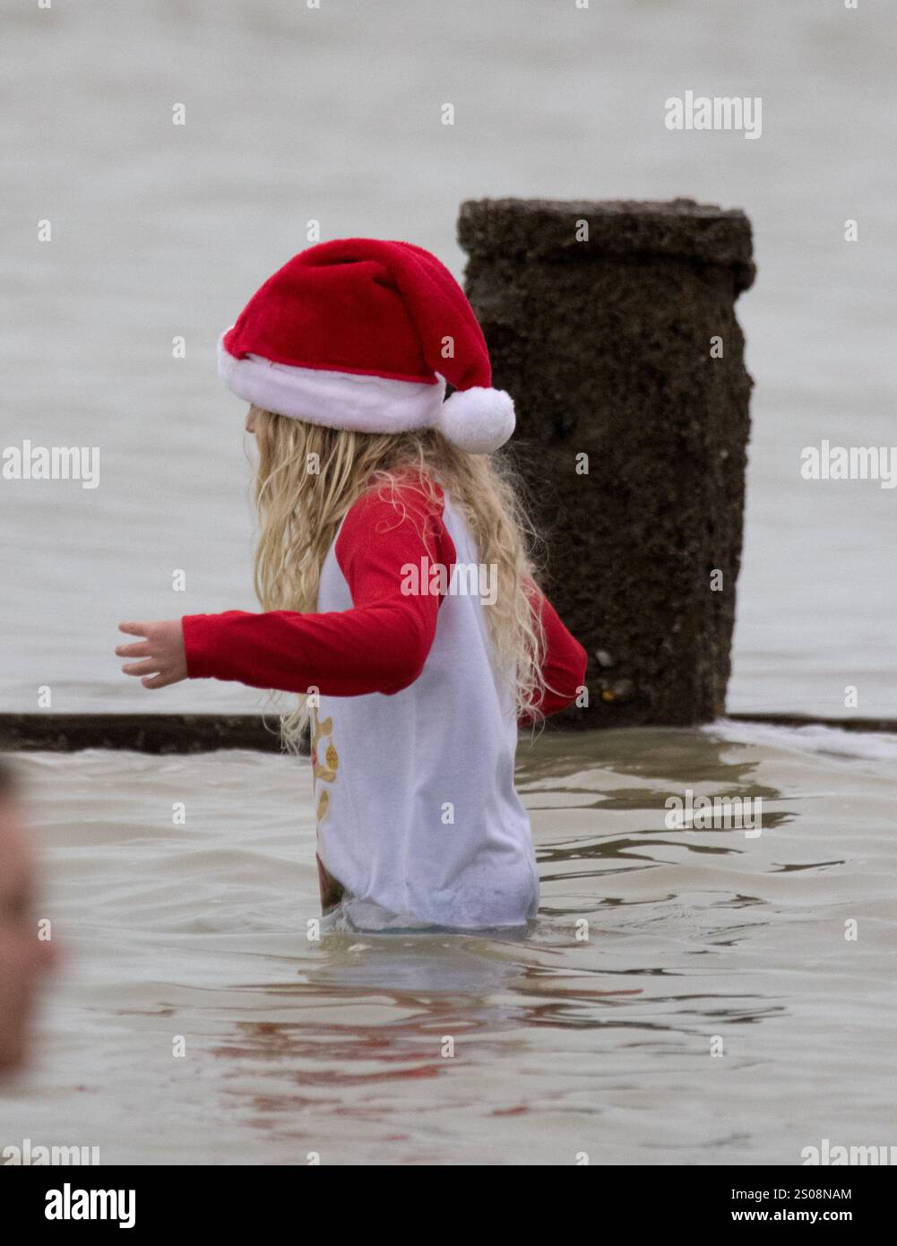 Eastbourne, East Sussex, UK. 26th Dec, 2024. Locals, many in festive ...