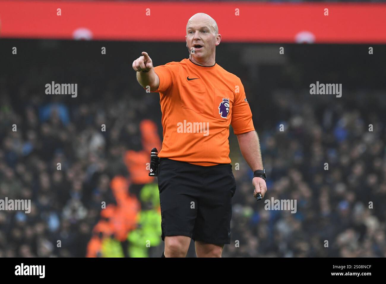 Referee Simon Hooper points during the English Premier League soccer ...