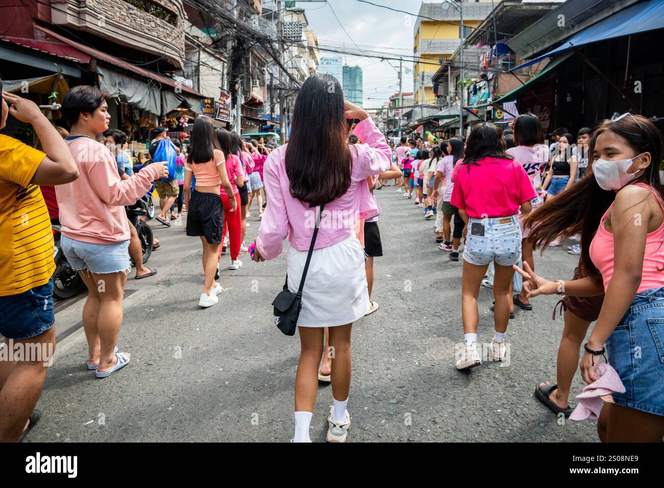 Filipino people celebrate an annual religious festival with a parade ...