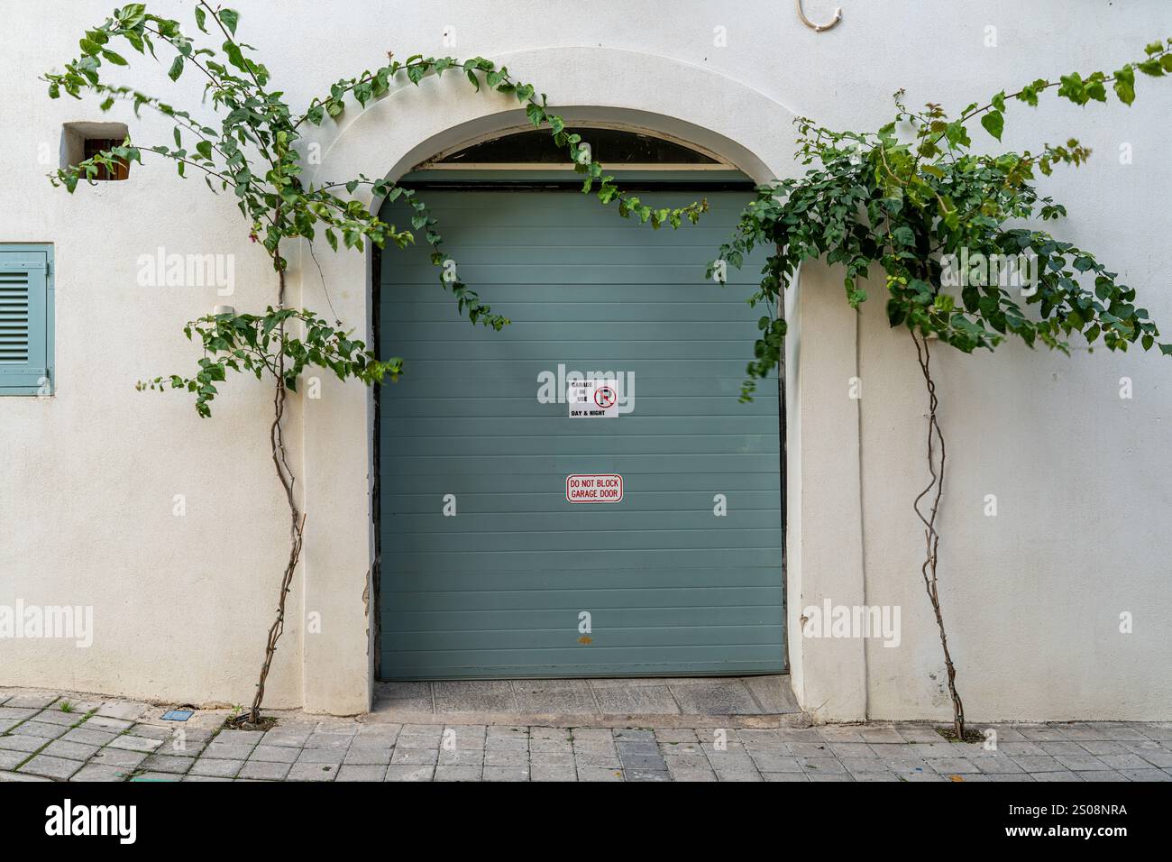 Traditional house detail in Malta. Limestone yellow bricks and colorful ...