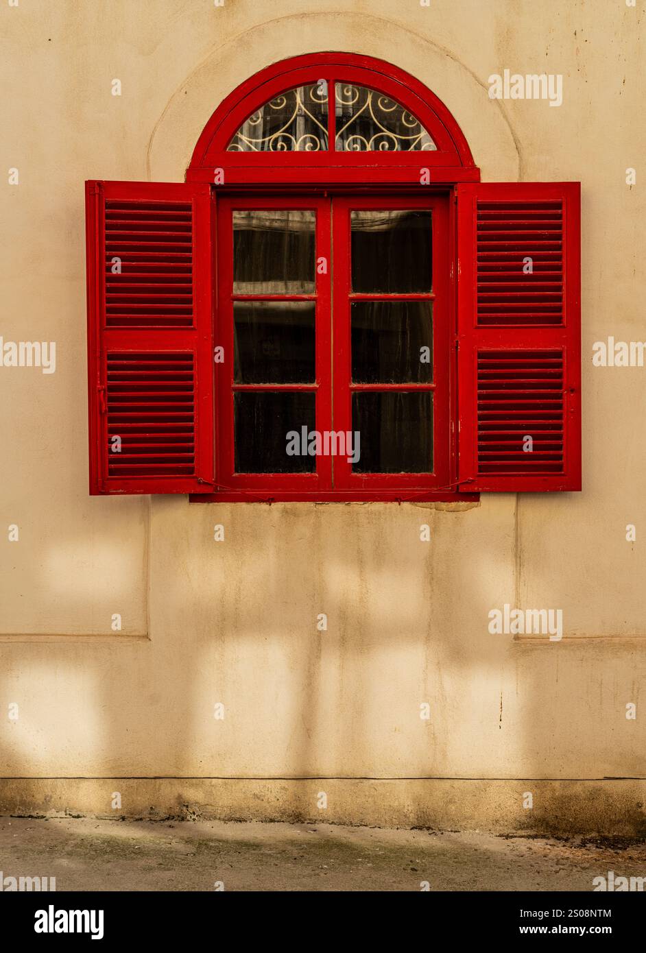 Traditional house detail in Malta. Limestone yellow bricks and colorful ...