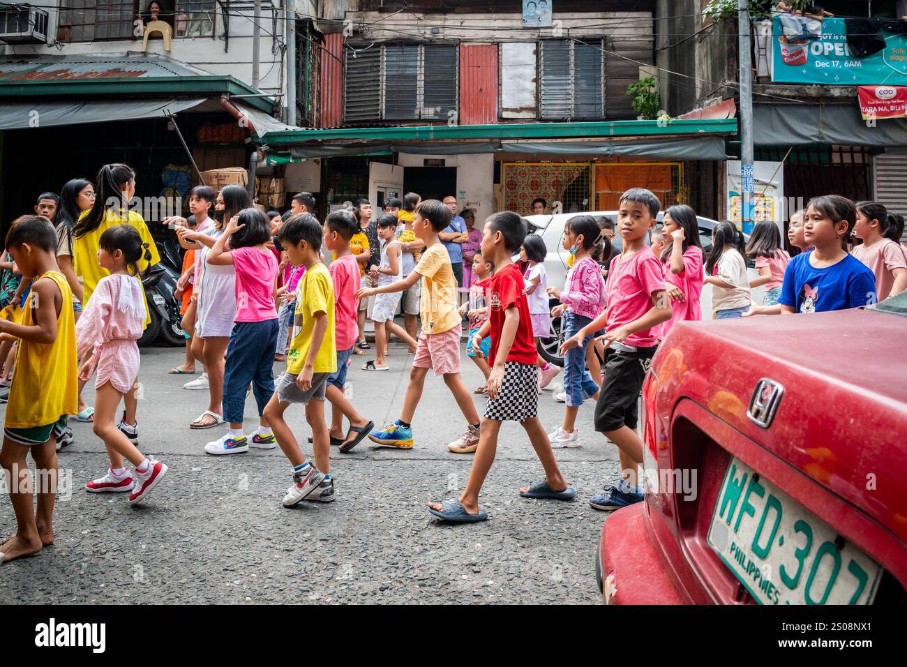 Filipino people celebrate an annual religious festival with a parade ...