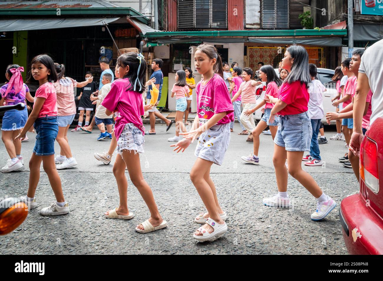 Filipino people celebrate an annual religious festival with a parade ...