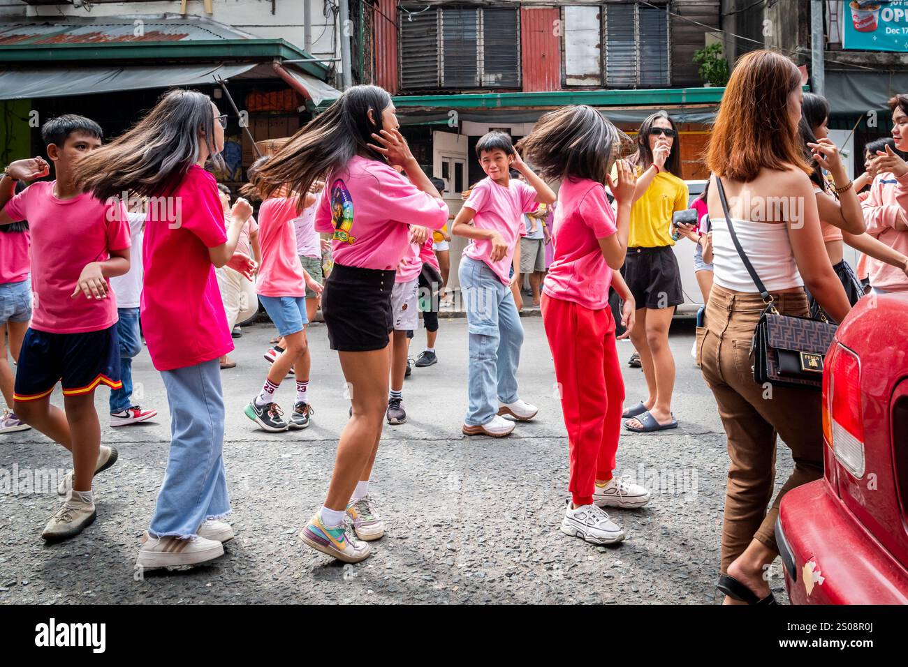 Filipino people celebrate an annual religious festival with a parade ...