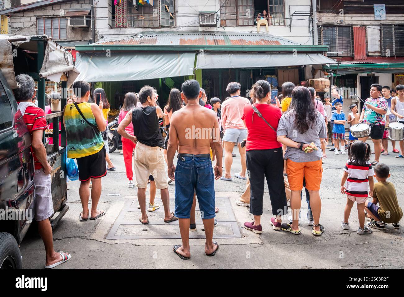 Filipino people celebrate an annual religious festival with a parade ...