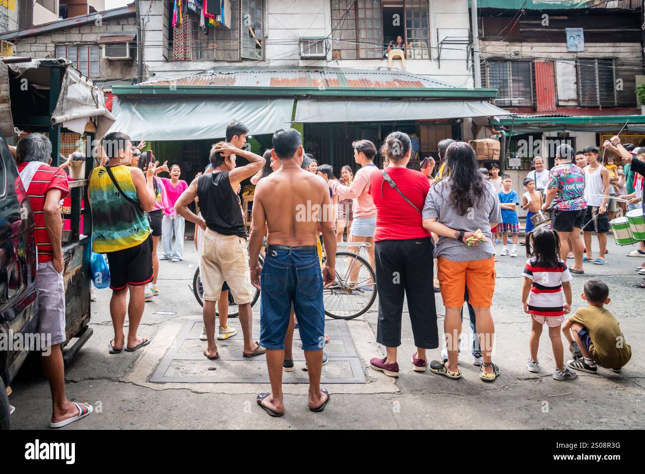 Filipino people celebrate an annual religious festival with a parade ...