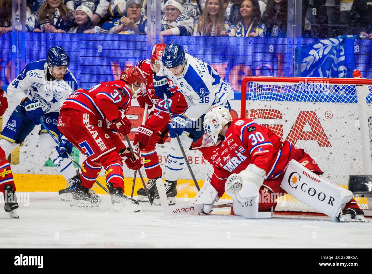 Leksand, Sverige. 26th Dec, 2024. 241226 Leksands Hannes Hellberg mot Timrås målvakt Jacob ...