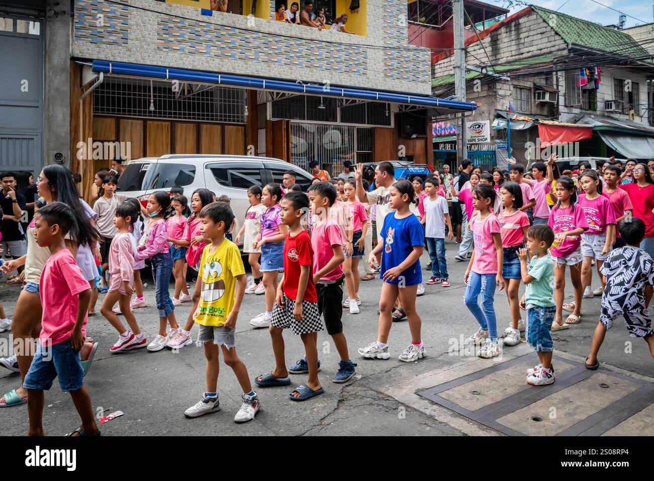 Filipino people celebrate an annual religious festival with a parade ...