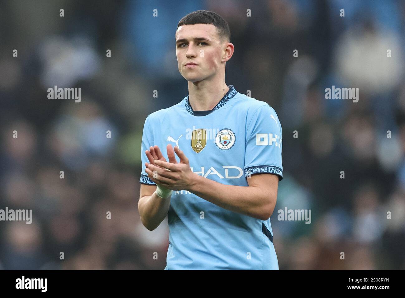 Phil Foden of Manchester City applauds the fans after the final whistle ...