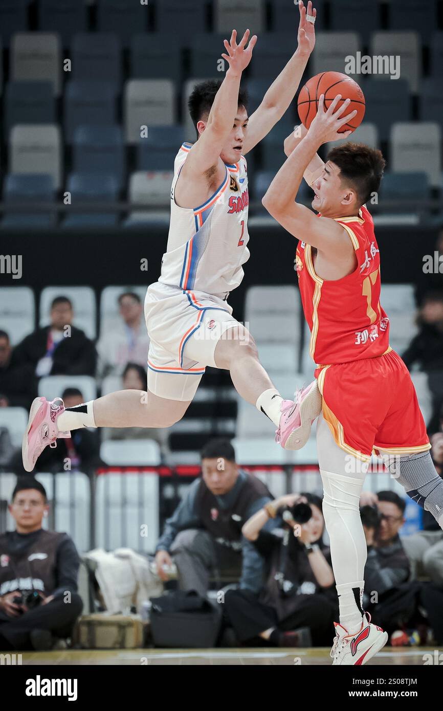 Hangzhou, China's Zhejiang Province. 26th Dec, 2024. Sun Minghui (R) of ...