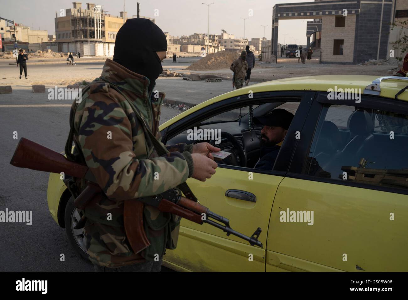 A member of the security forces of the newly formed Syrian government ...