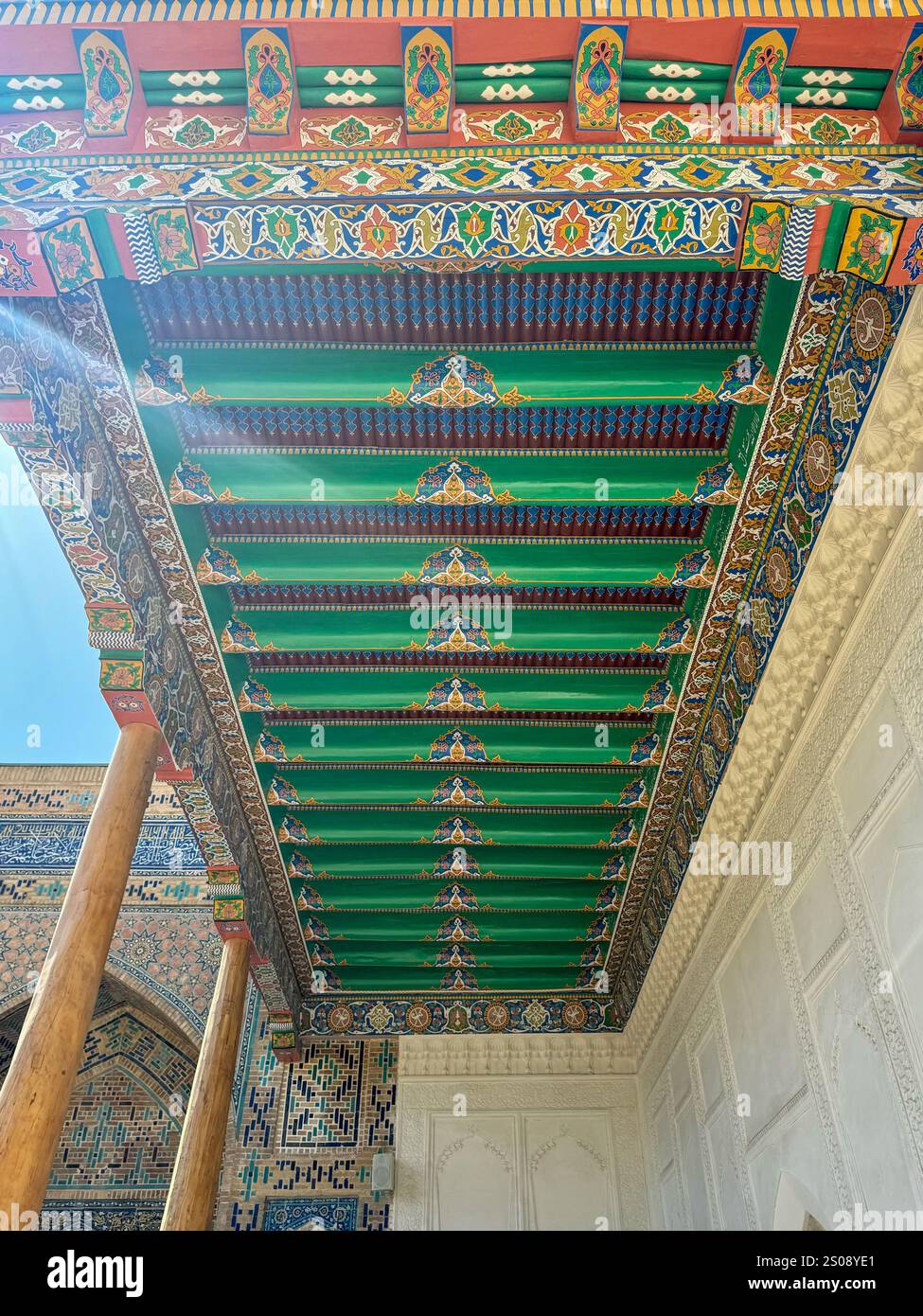 Traditional painted wooden ceiling with intricate patterns in Central ...