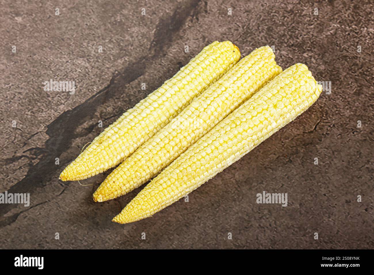 Raw sweet ripe baby corn heap Stock Photo - Alamy