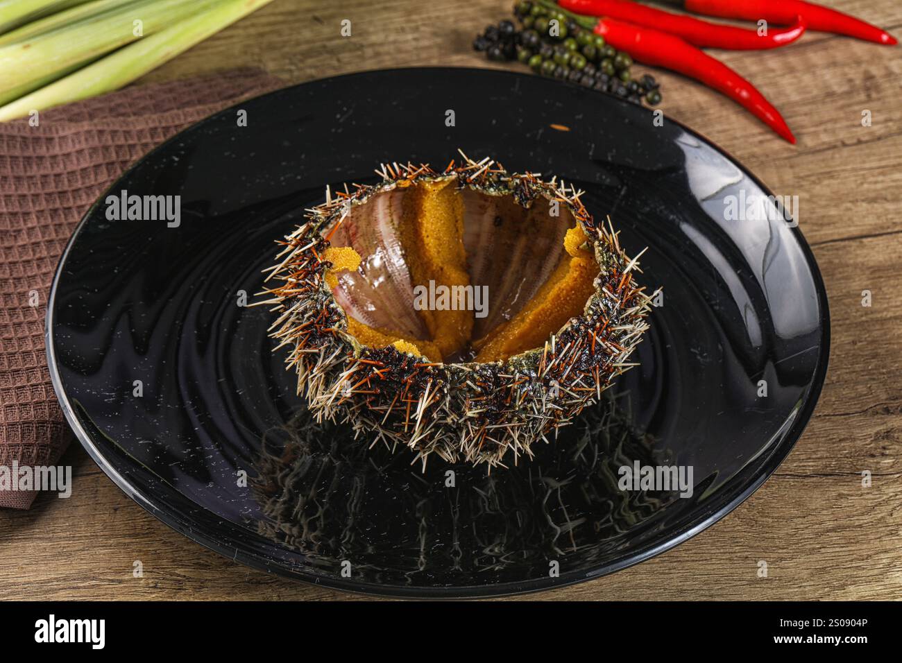 Delicous luxury raw sea urchin delicatessen Stock Photo - Alamy