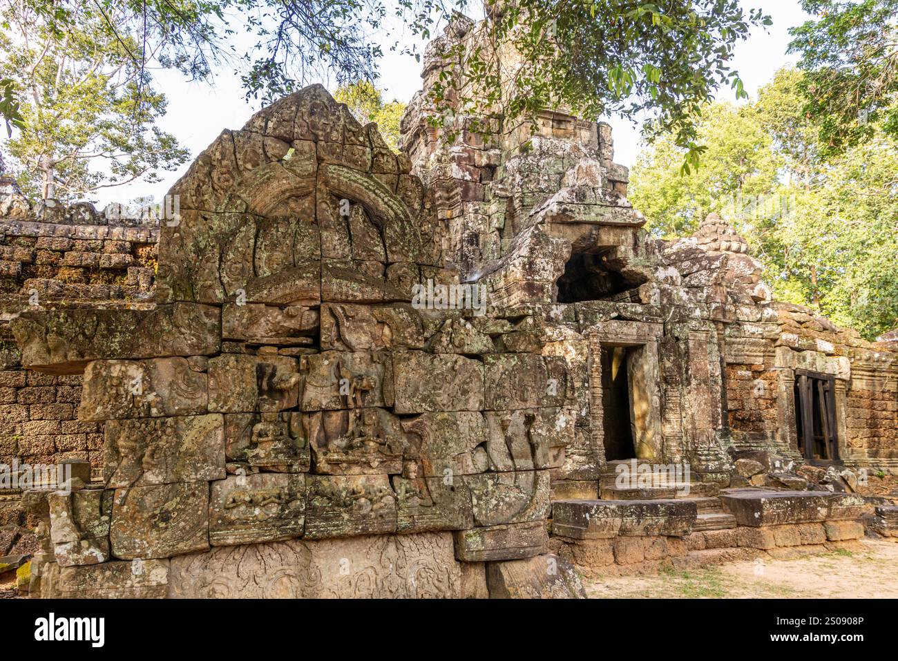 Ancient hindu Ta Som khmer ruined temple entrance decorated with ...