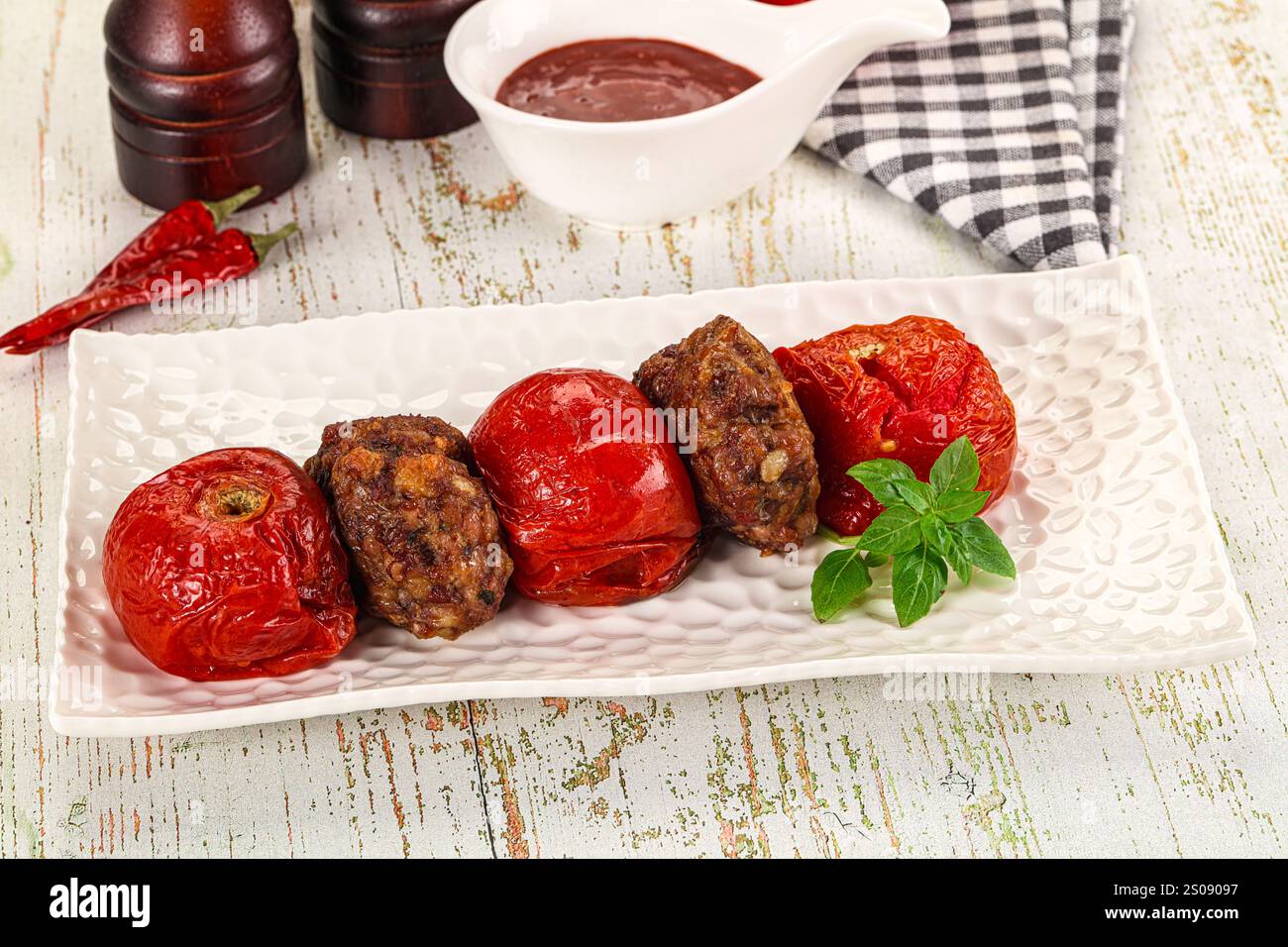 Turkish cuisine - Domatesli Kebab with minced meat and tomato Stock ...