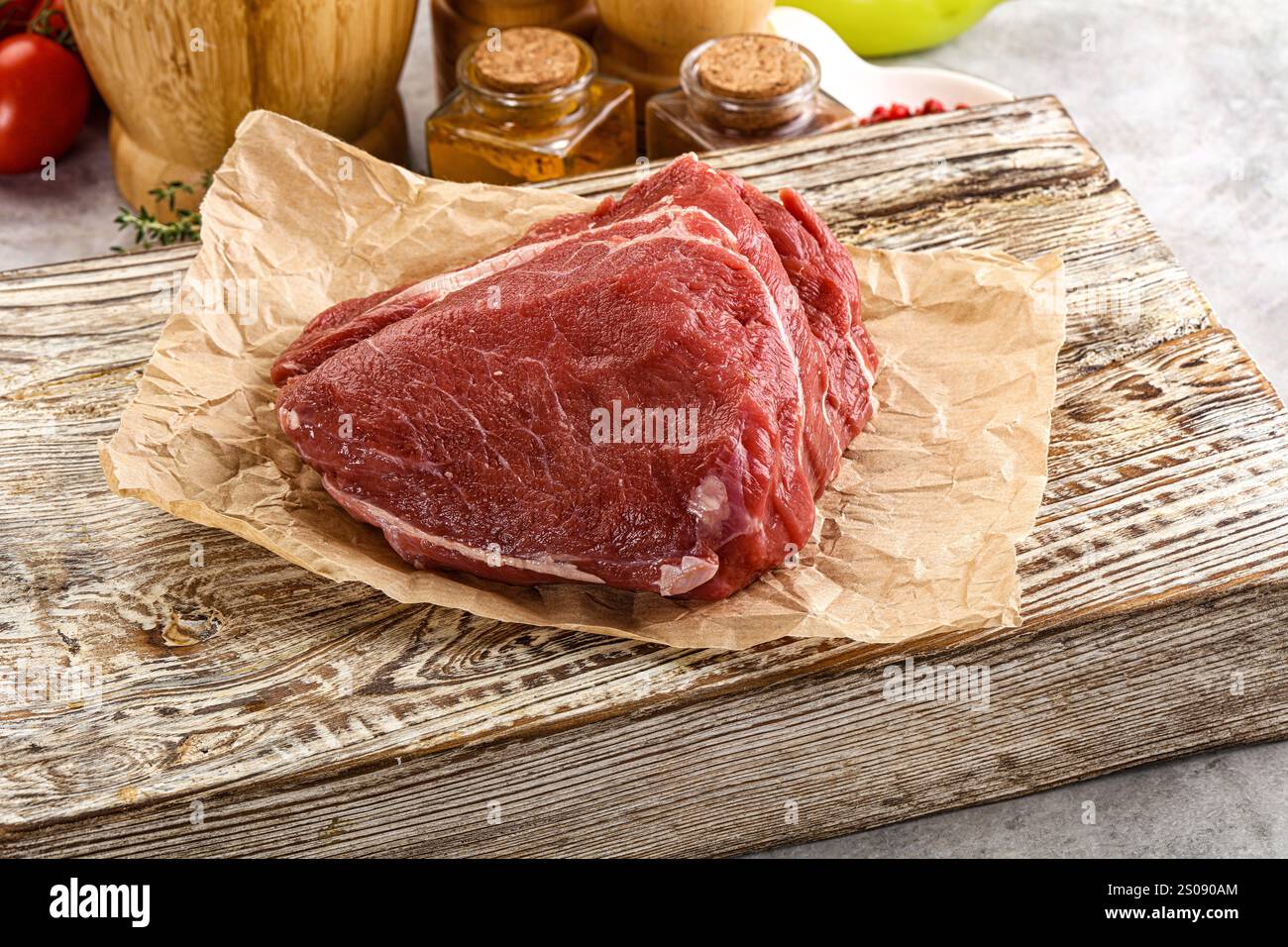 Raw beef meat piece for cooking Stock Photo - Alamy