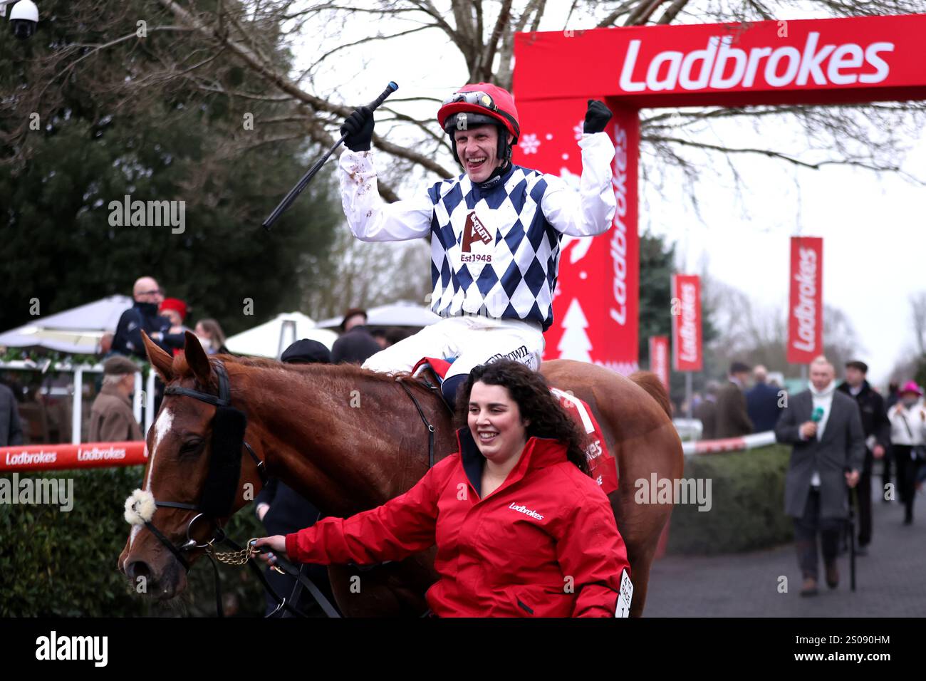 Jockey Paul Townend celebrates victory in the Ladbrokes King George VI ...