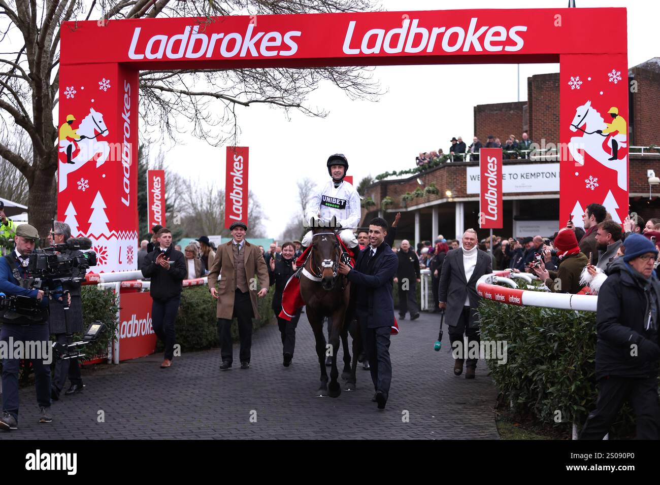 Jockey Nico de Boinville celebrates after winning the Ladbrokes ...