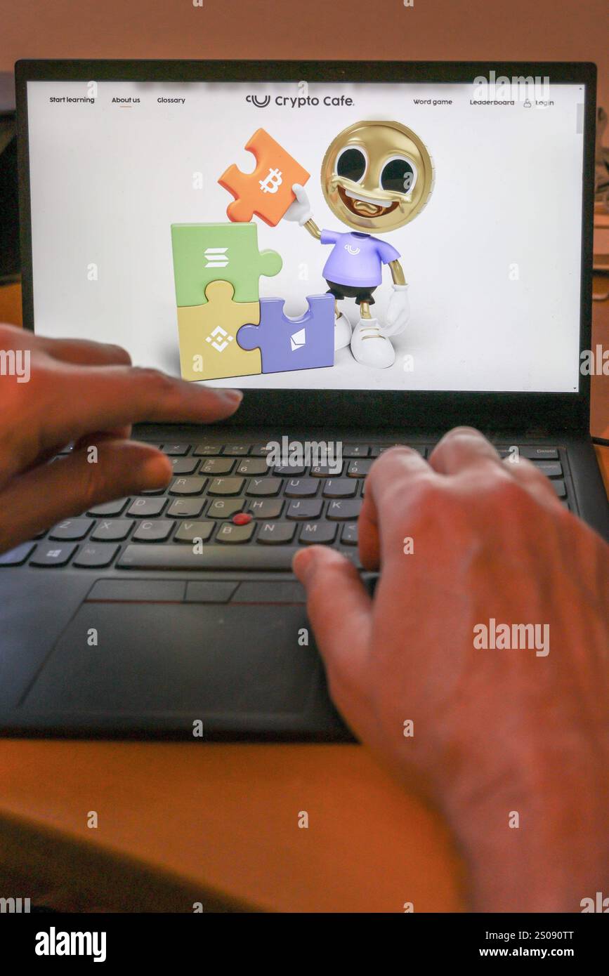 Mesa, USA. 24th Dec, 2024. A Crypto Caf page is displayed on a home screen in Mesa Arizona USA ...