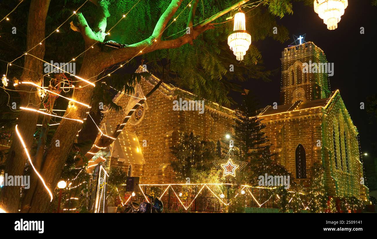 Beawar, India, December 24, 2024: Shoolbred Memorial Church illuminated ...