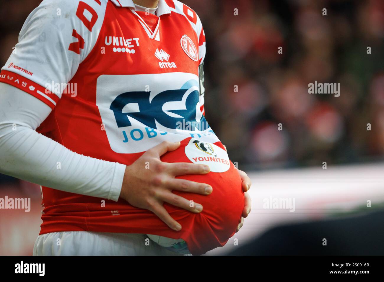 Kortrijk's Bram Lagae pictured with the Younited logo during a soccer ...