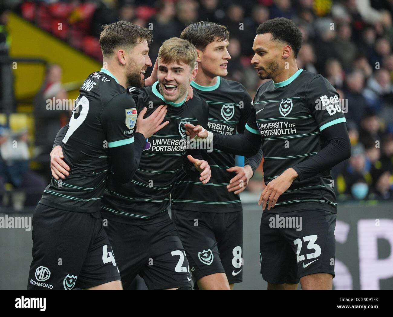 Portsmouth's Zak Swanson (2nd left) celebrates with teammates after ...
