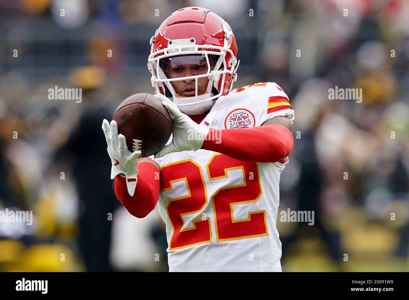 Kansas City Chiefs cornerback Trent McDuffie (22) warms up before an ...