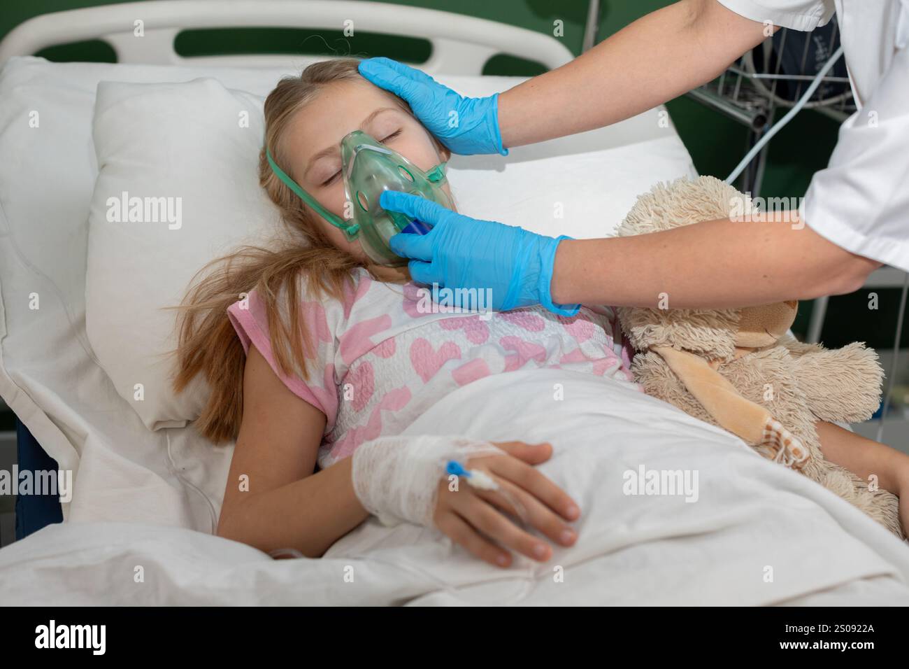 A Child Receiving Vital Medical Attention with an Oxygen Mask During ...