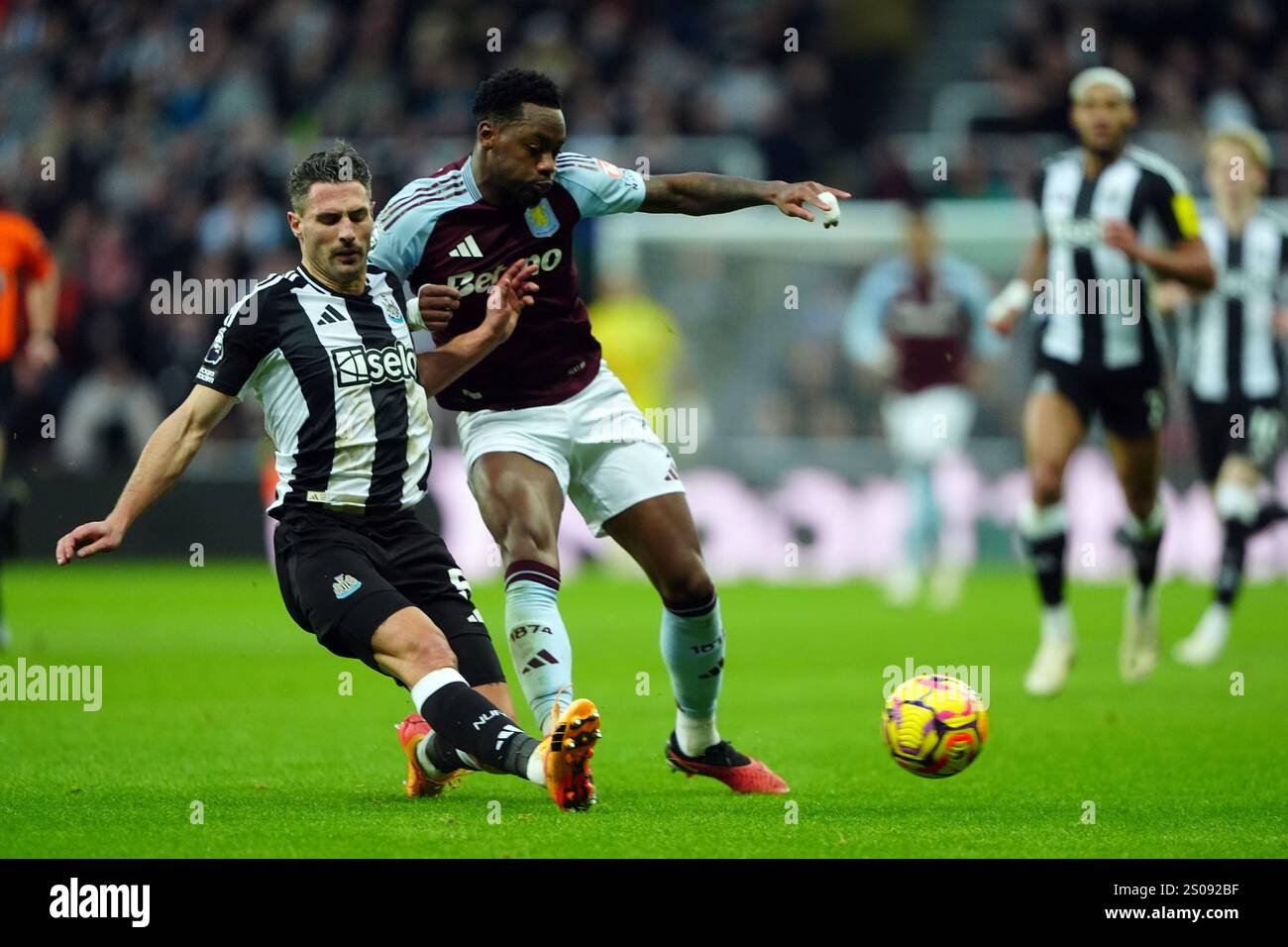 Newcastle United's Fabian Schar (left) after being fouled by Aston ...